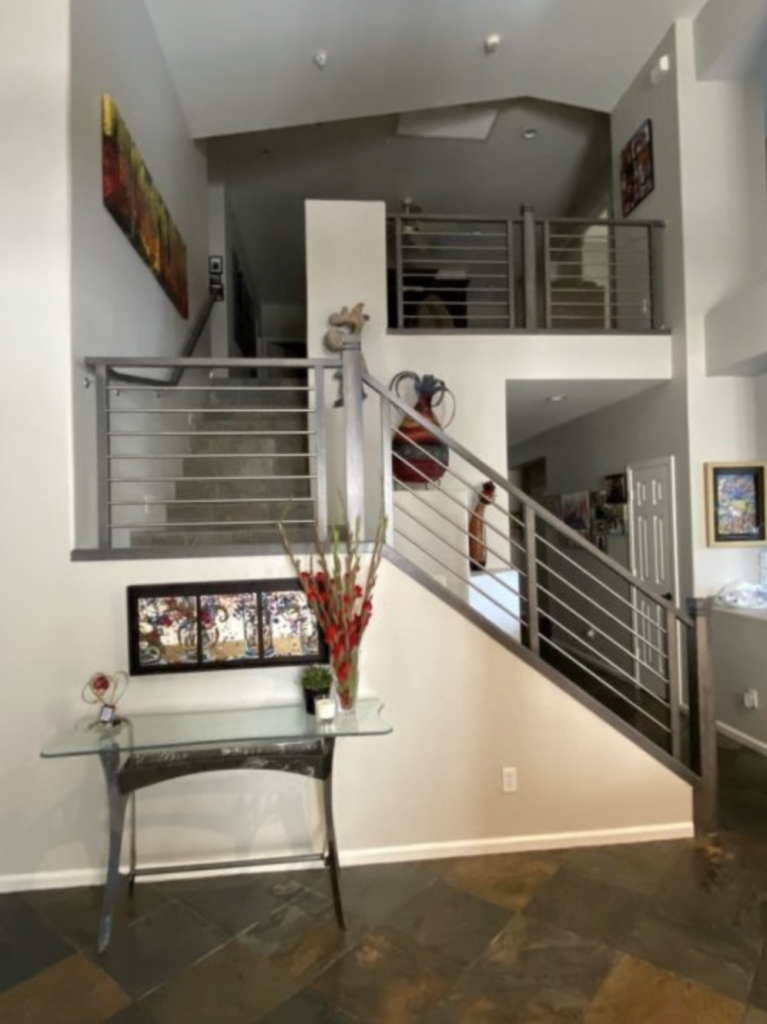 Easy Home Stair Railing Remodel: Install a Striking Metal Railing
